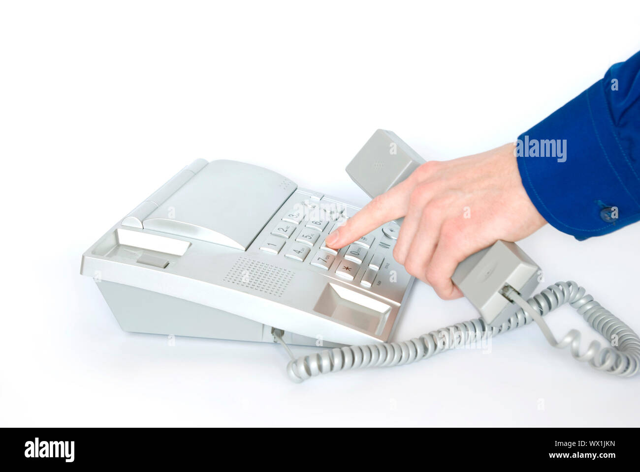 Finger presses figure on phone Stock Photo - Alamy