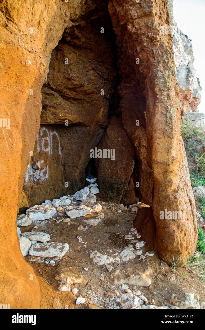 Hunstanton, Norfolk, England, Coastal caves are formed in the cliffs ...