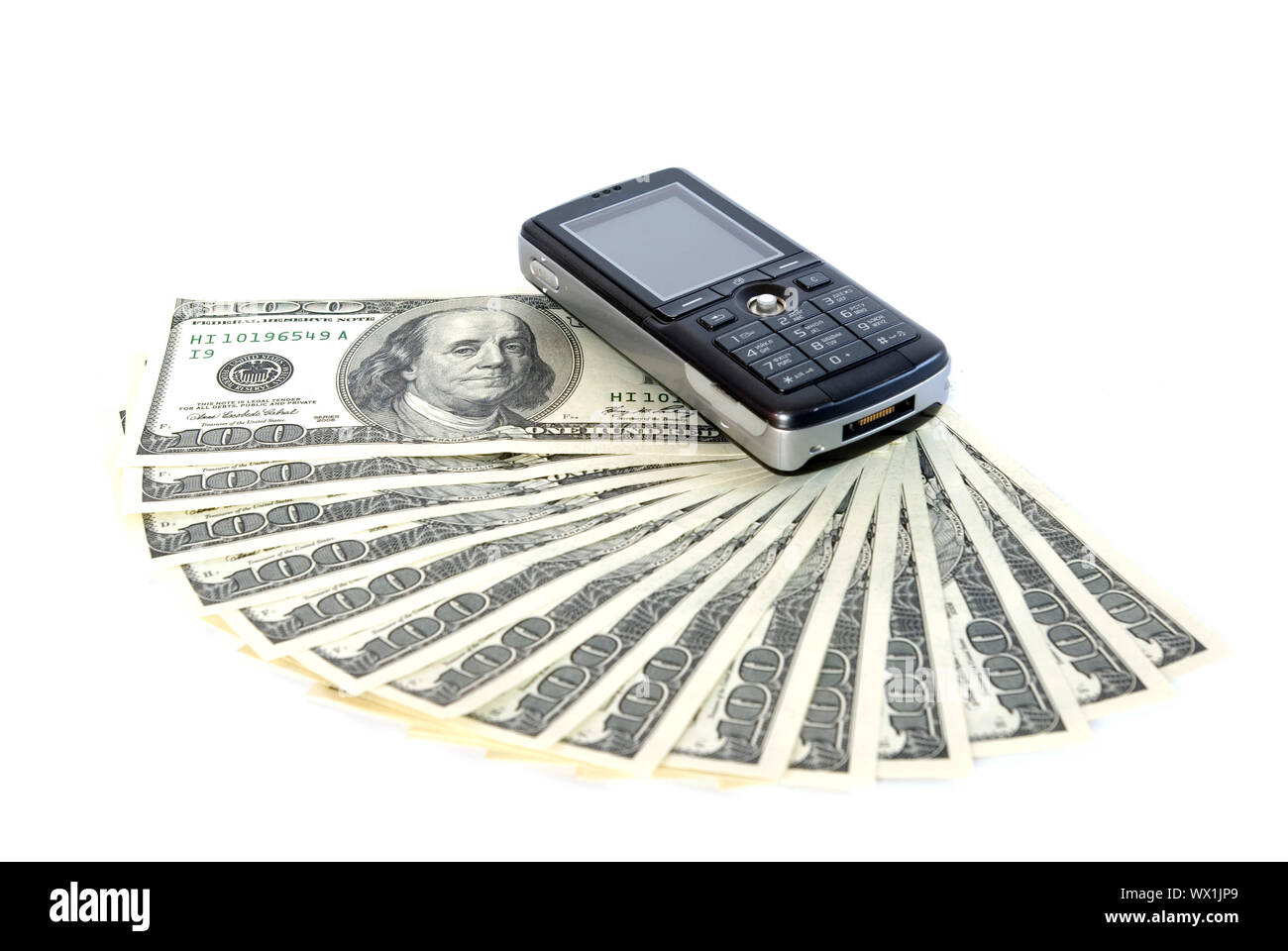 Money with a telephone on a white background Stock Photo - Alamy