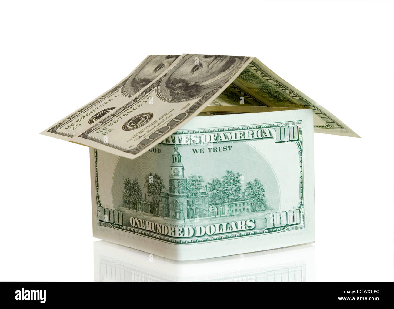 Money house on white background Stock Photo - Alamy