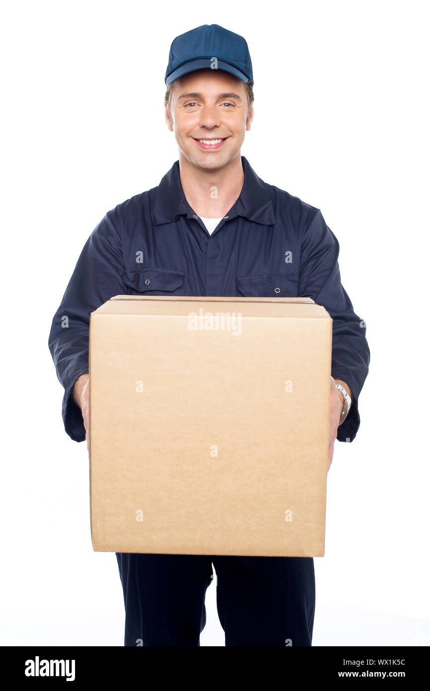 Please accept your courier sir. Guy delivering carton Stock Photo - Alamy