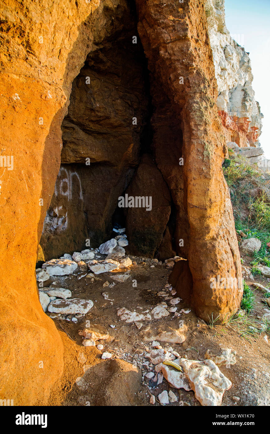 Hunstanton, Norfolk, England, Coastal caves are formed in the cliffs ...