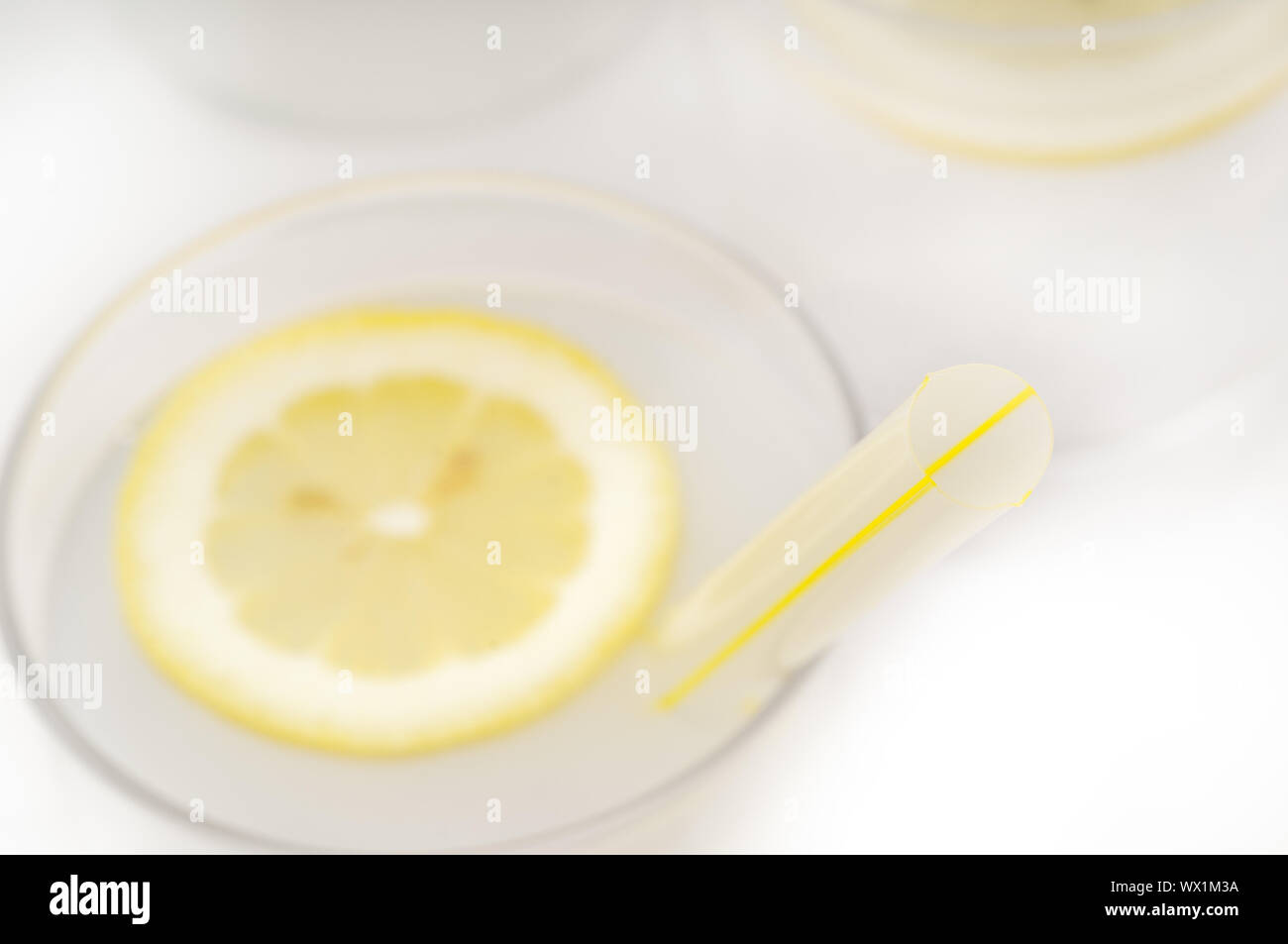 fresh lemonade drink with lemon slice closeup Stock Photo - Alamy