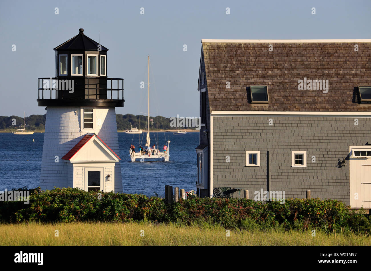 Hyannis Harbor Lighthouse aka Lewis Bay Lighthouse with a catamaran ...