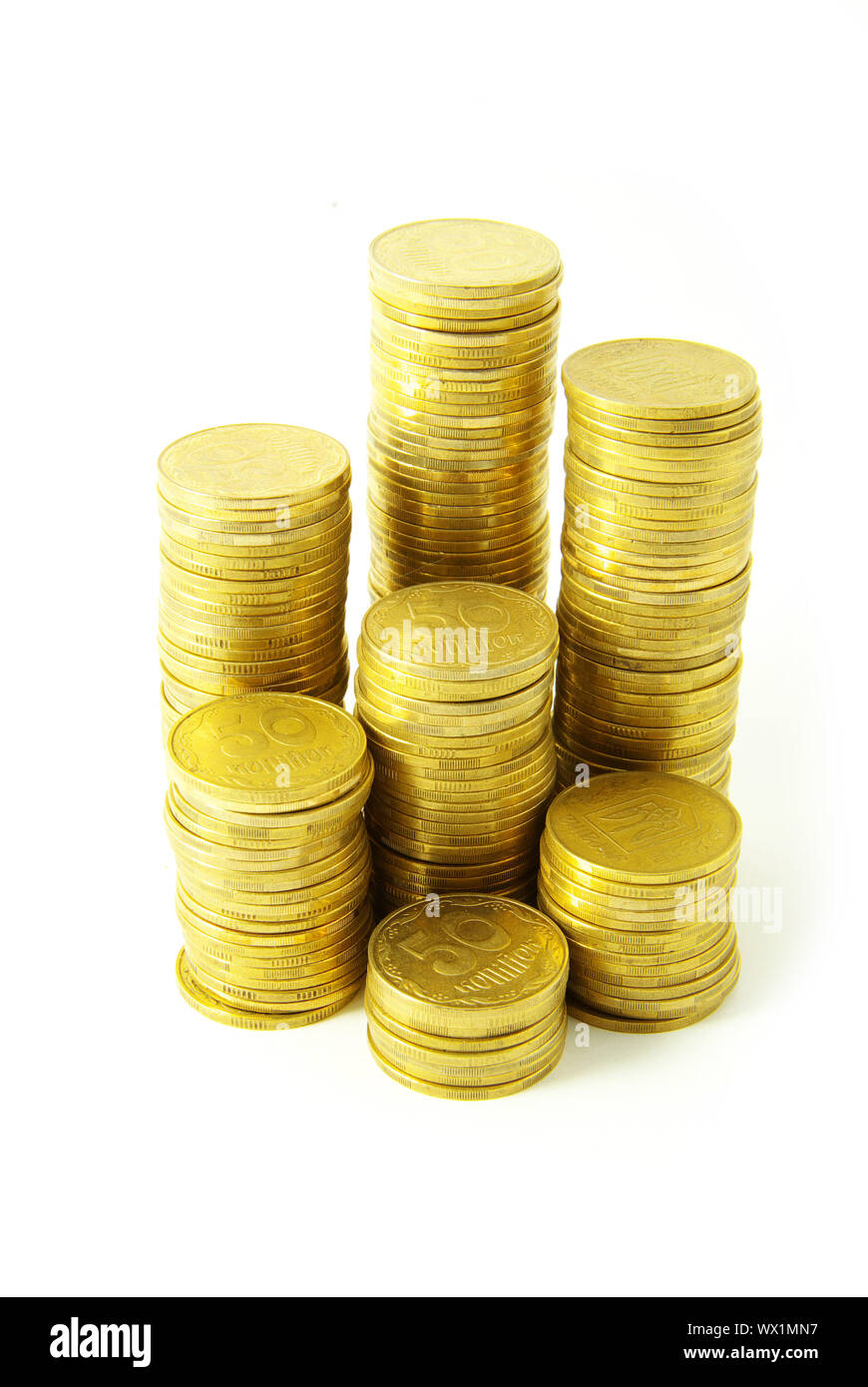 three towers of coins isolated on a whiteness Stock Photo - Alamy