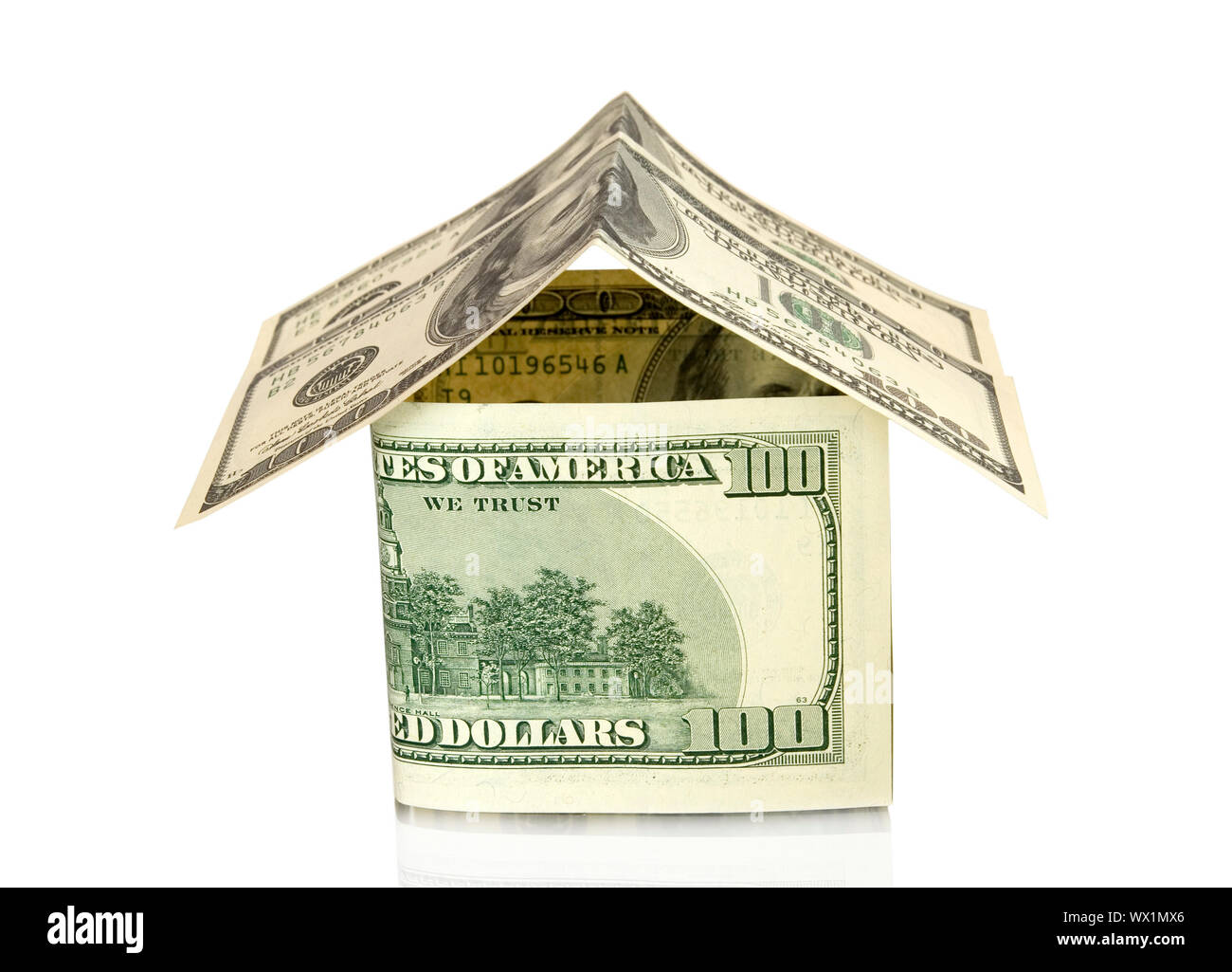 Money house on white background Stock Photo - Alamy