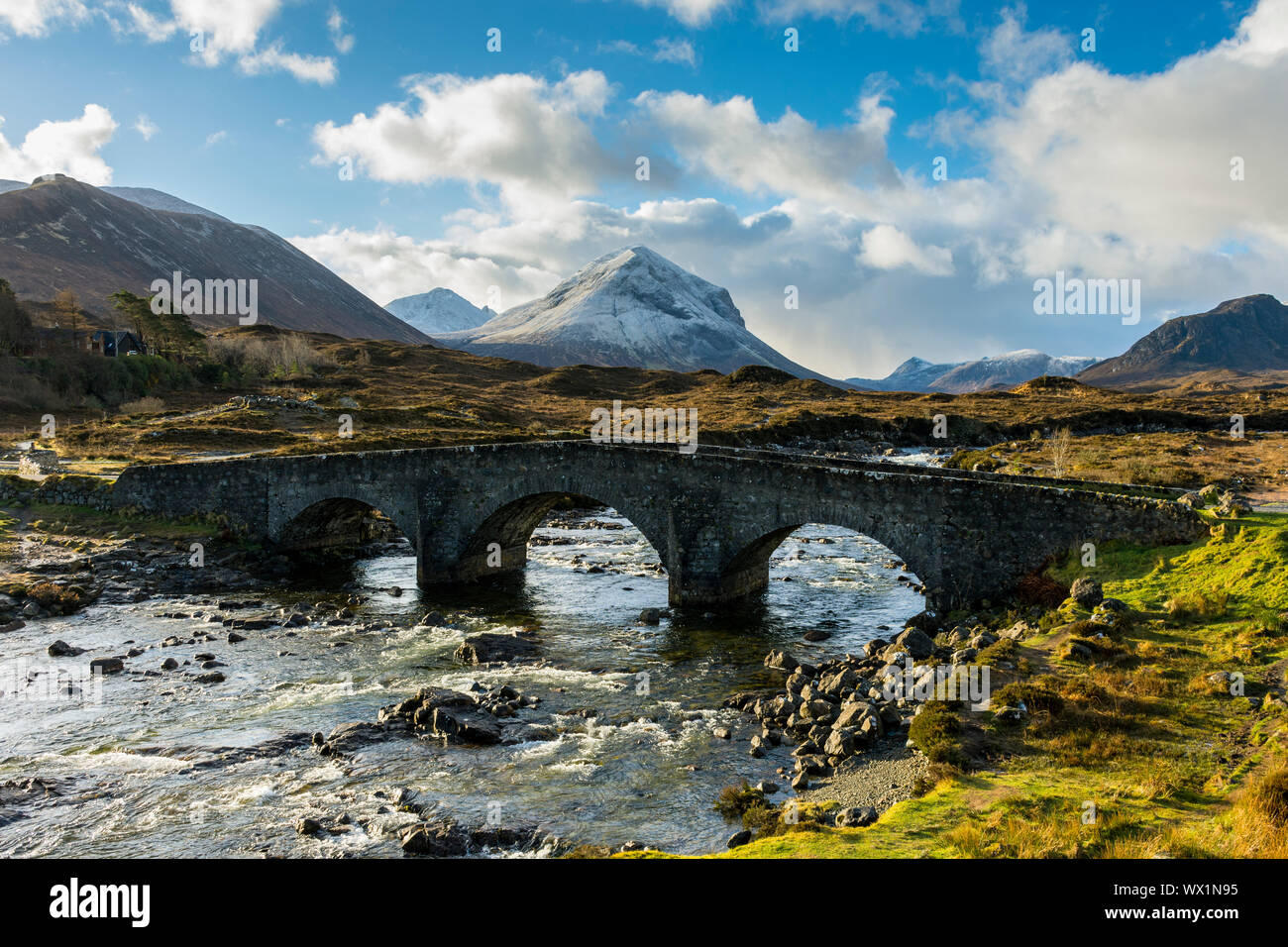 The peak of Marsco in the Red Cuillin hills, and the old bridge at ...