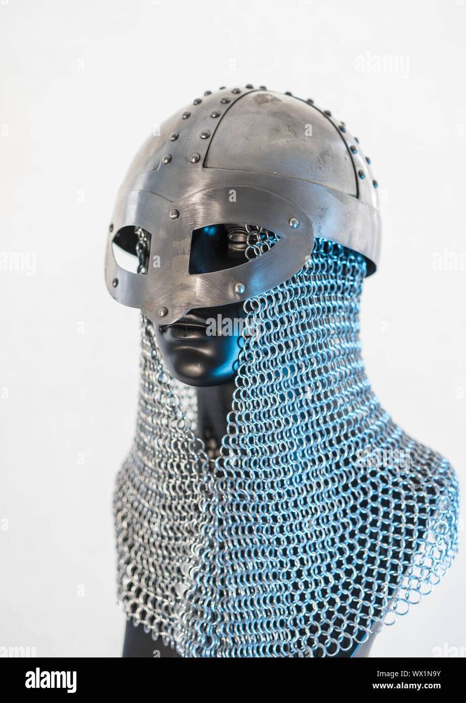 Costume, Viking helmet with chain mail in a black mannequin on white ...