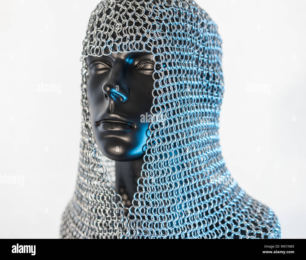 Costume, Viking helmet with chain mail in a black mannequin on white ...