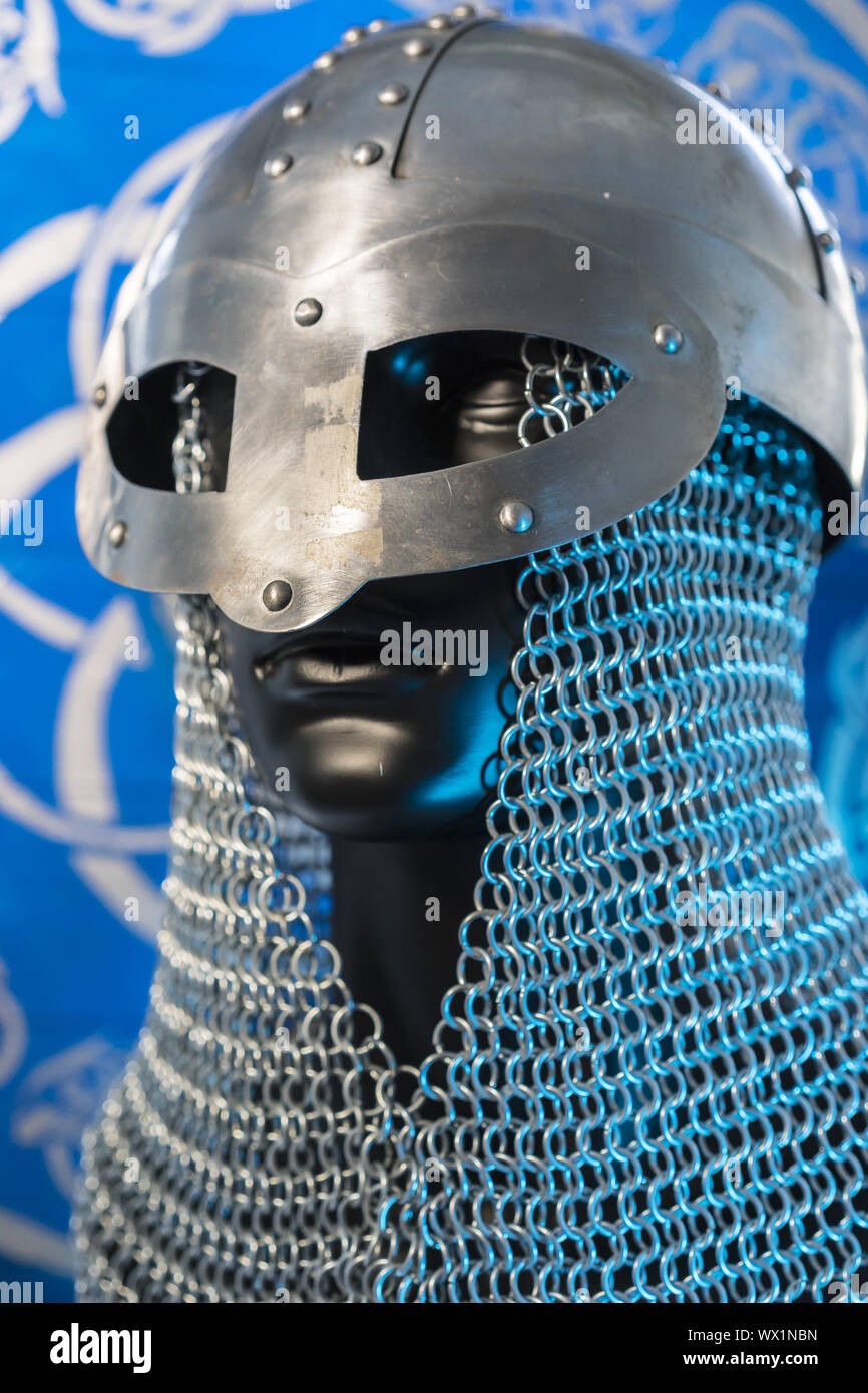 berserker, helmet of viking warrior with mail on coat of arms with ...