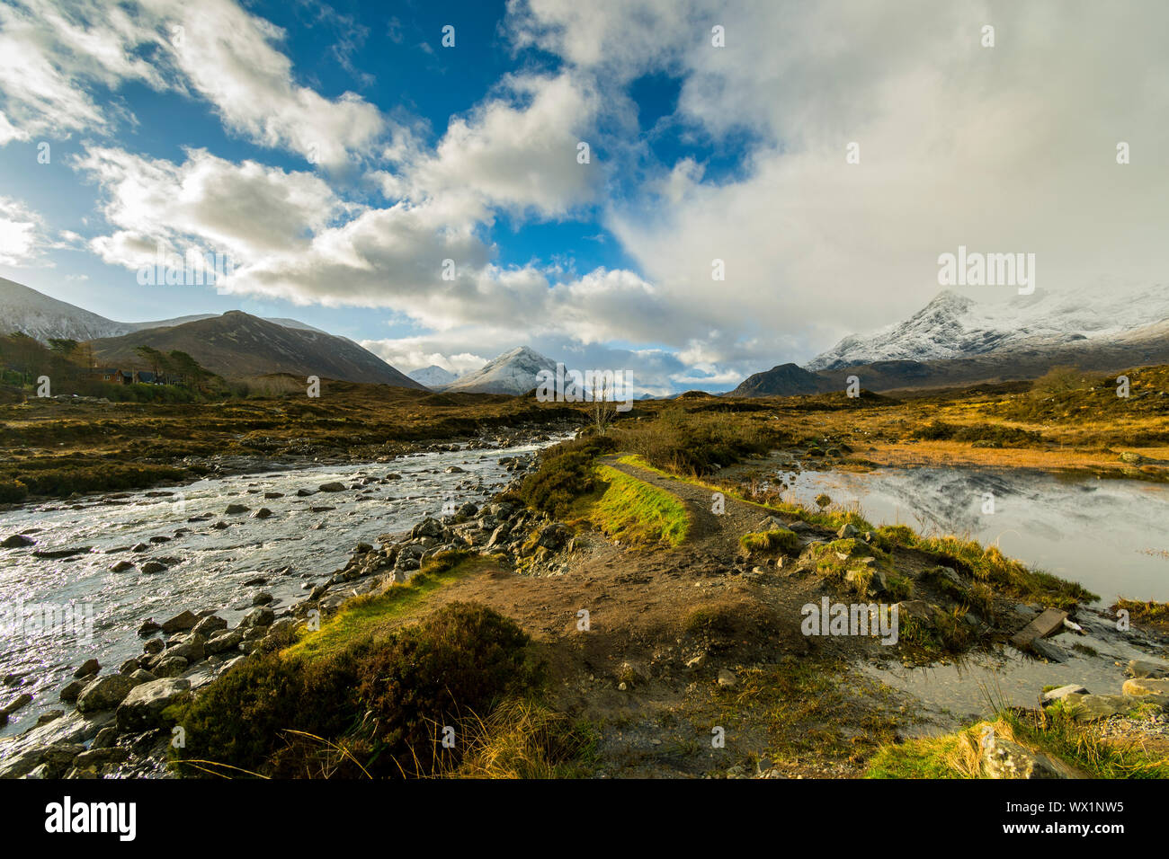 Glen Sligachan with a snow shower over the Black Cuillin mountains ...