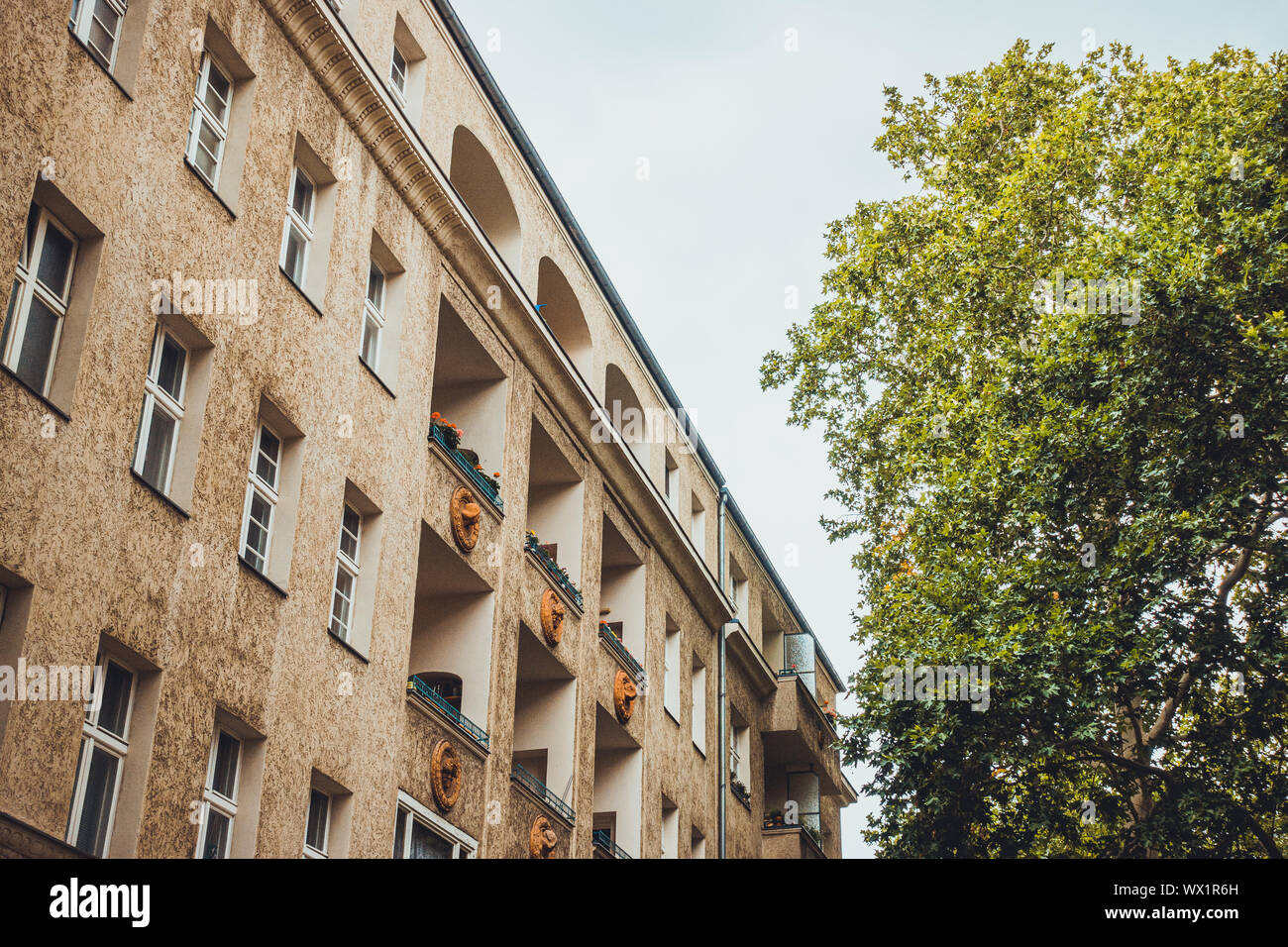 apartment building on a grey day at berlin, germany Stock Photo - Alamy