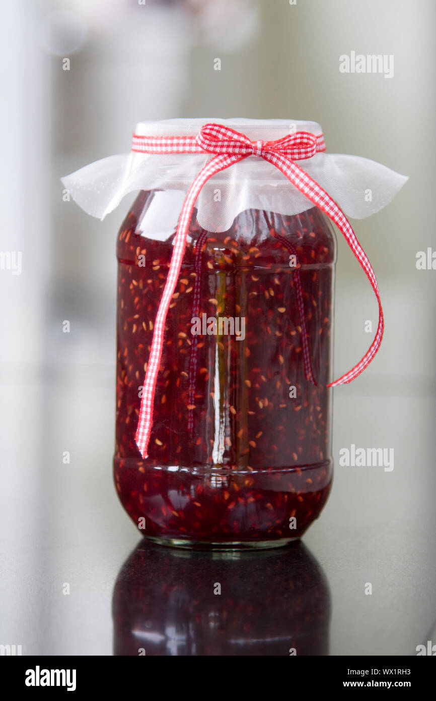 Red ribbon tied jar hi-res stock photography and images - Alamy