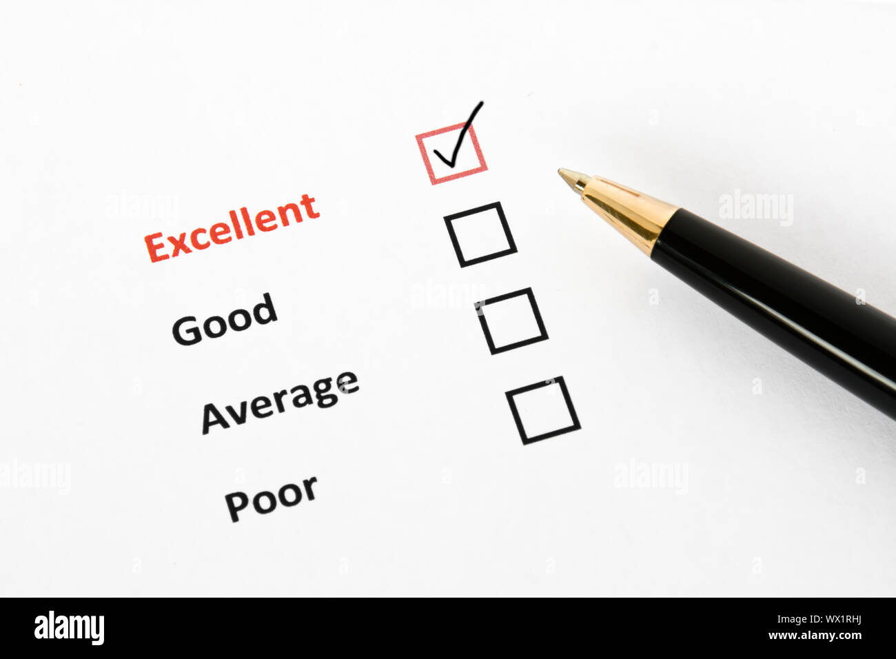 Customer questionnaire with "excellent" ticked Stock Photo - Alamy