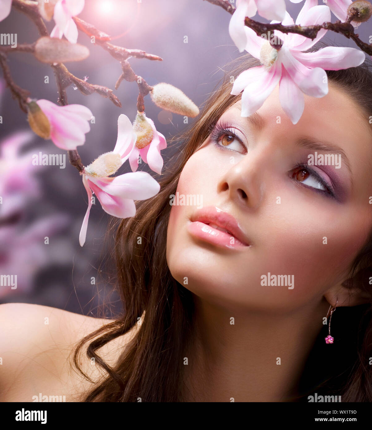 Beautiful Girl's face with flowers Stock Photo - Alamy