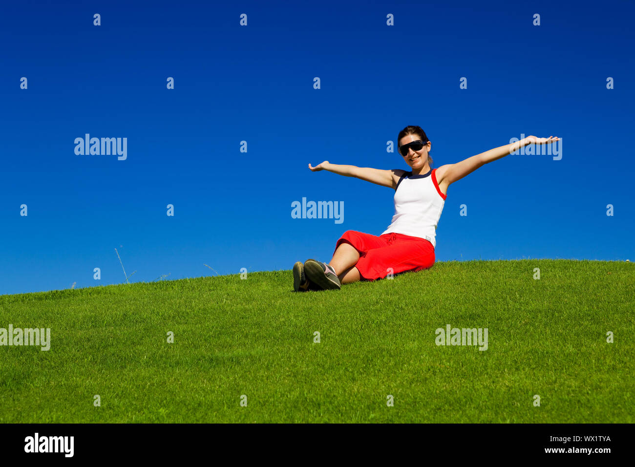 Outdoor portrait of a beautiful young woman enjoying the spring Stock ...