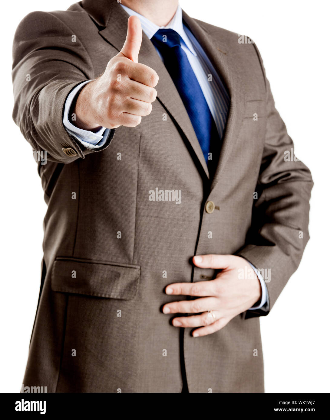 Successful business man with thumbs up Stock Photo - Alamy