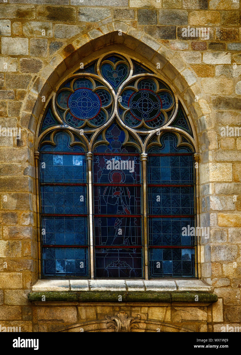 Beautiful arched window with glass painting Stock Photo - Alamy