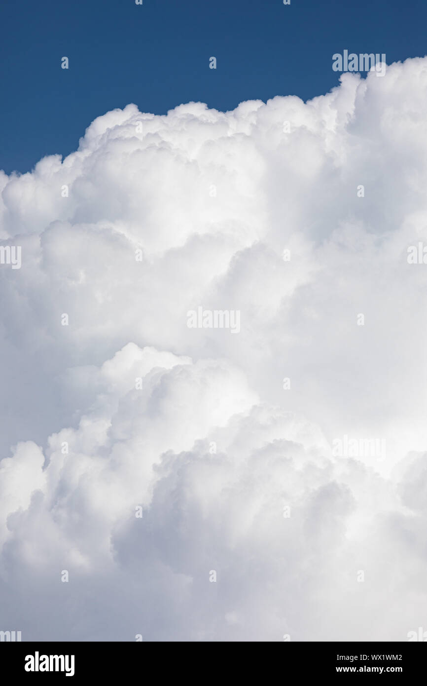 Fluffy cloud edge and blue sky cloudscape background Stock Photo - Alamy