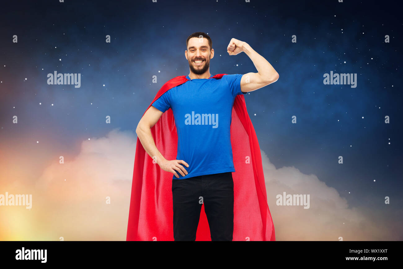 happy man in red superhero cape over night sky Stock Photo - Alamy
