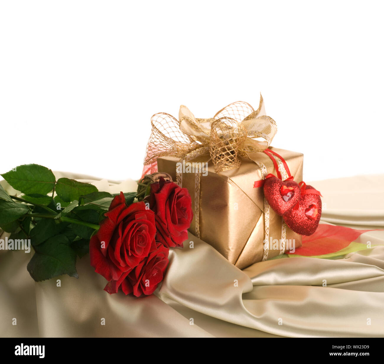 Gift Box And Red Roses Stock Photo - Alamy