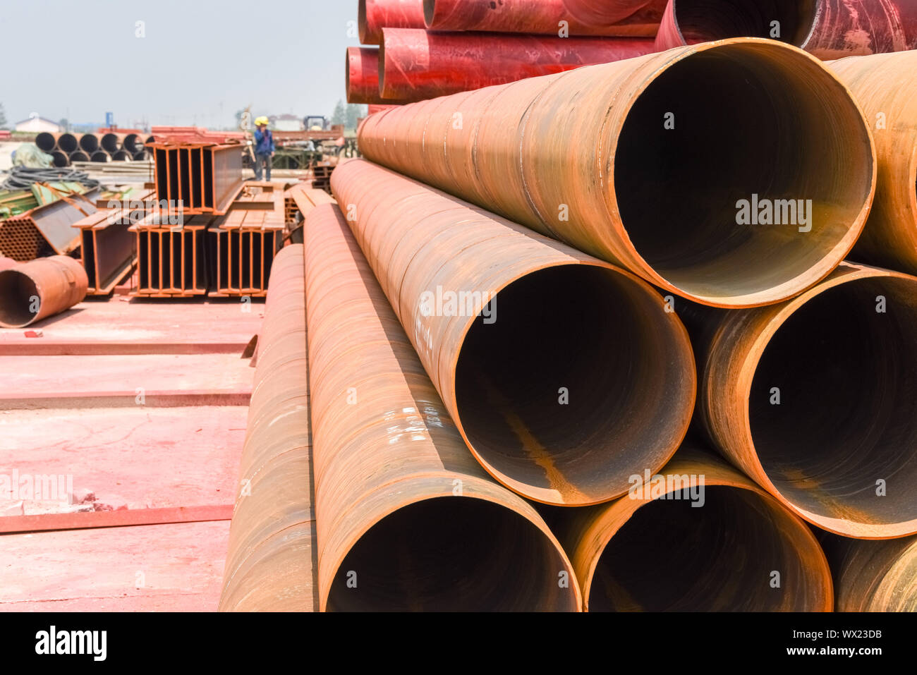 cylindrical steel tube on construction site Stock Photo - Alamy