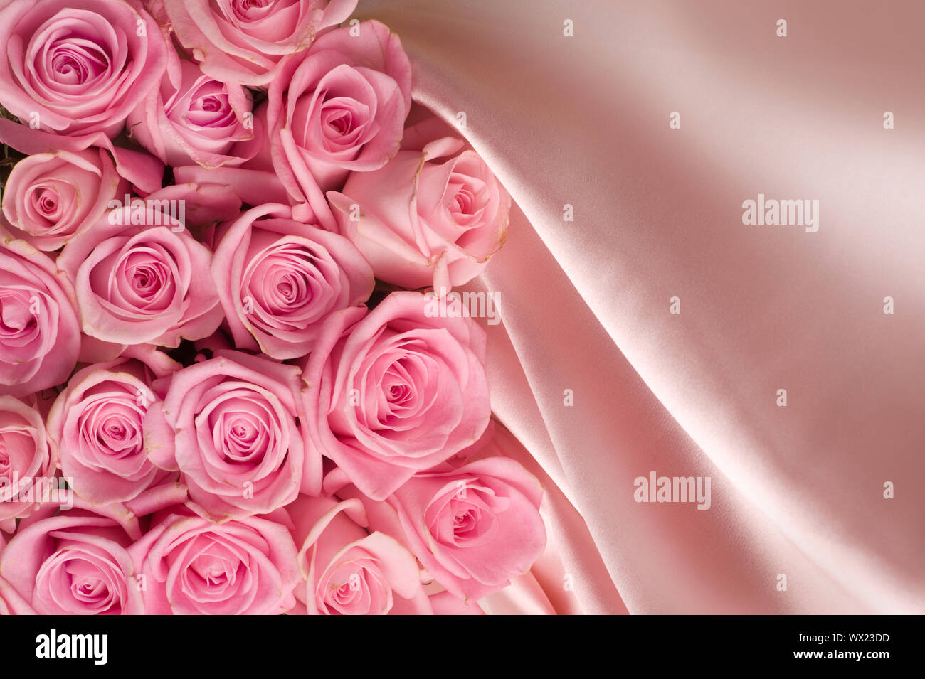 Roses And Silk Stock Photo - Alamy
