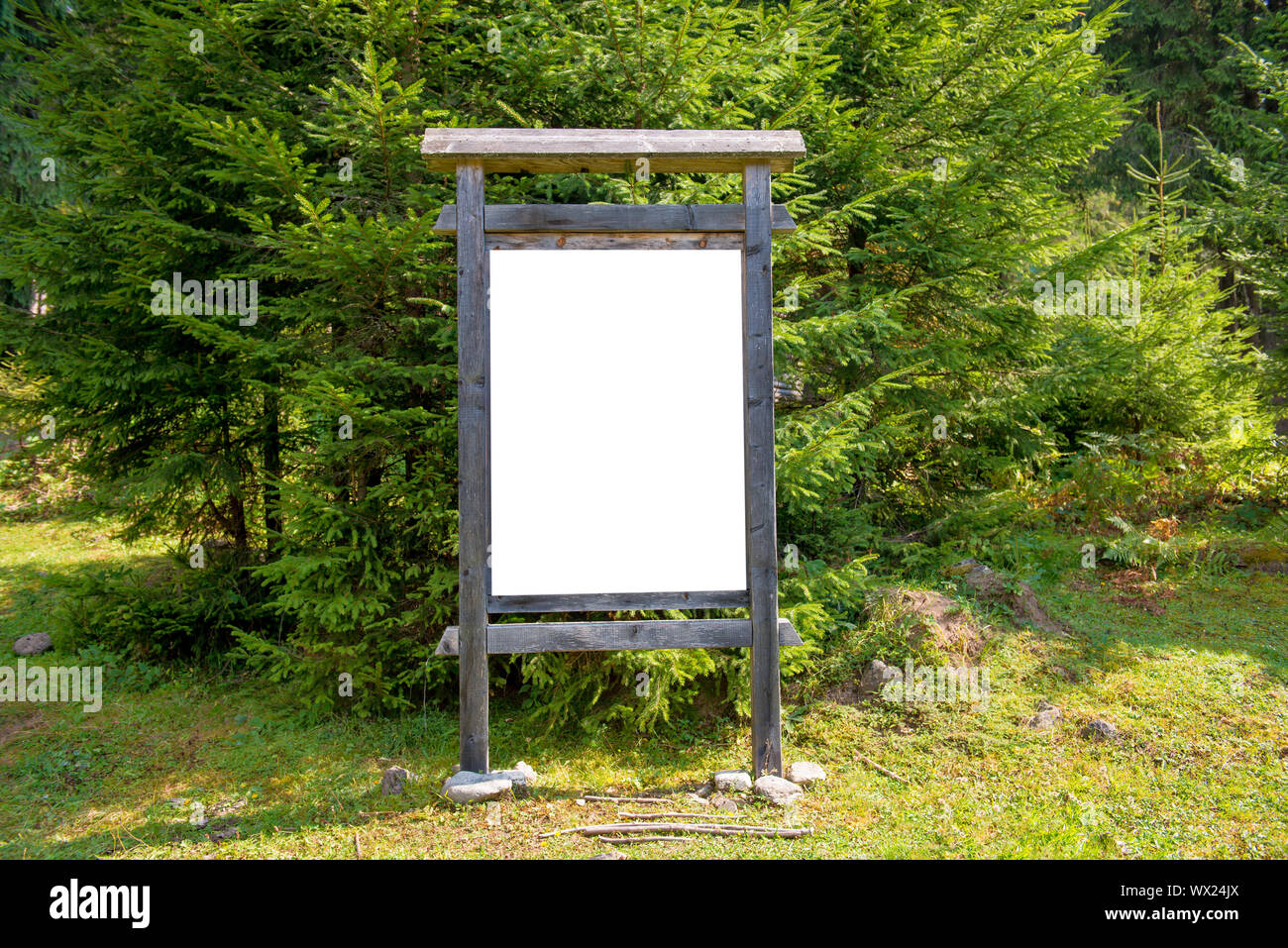 Blank sign board in the park Stock Photo - Alamy