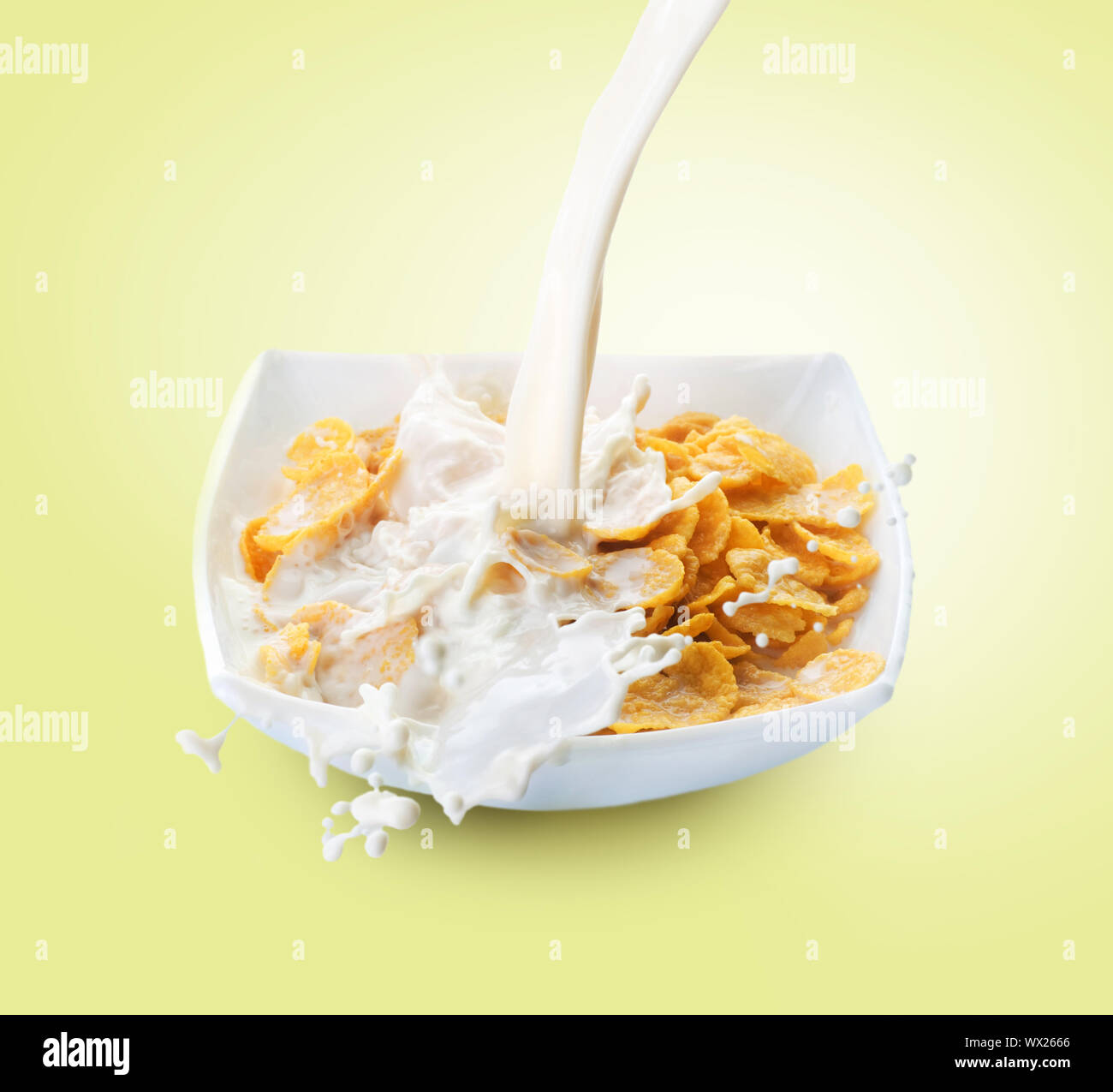 Healthy Breakfast. Cornflakes And Milk Splash Stock Photo - Alamy
