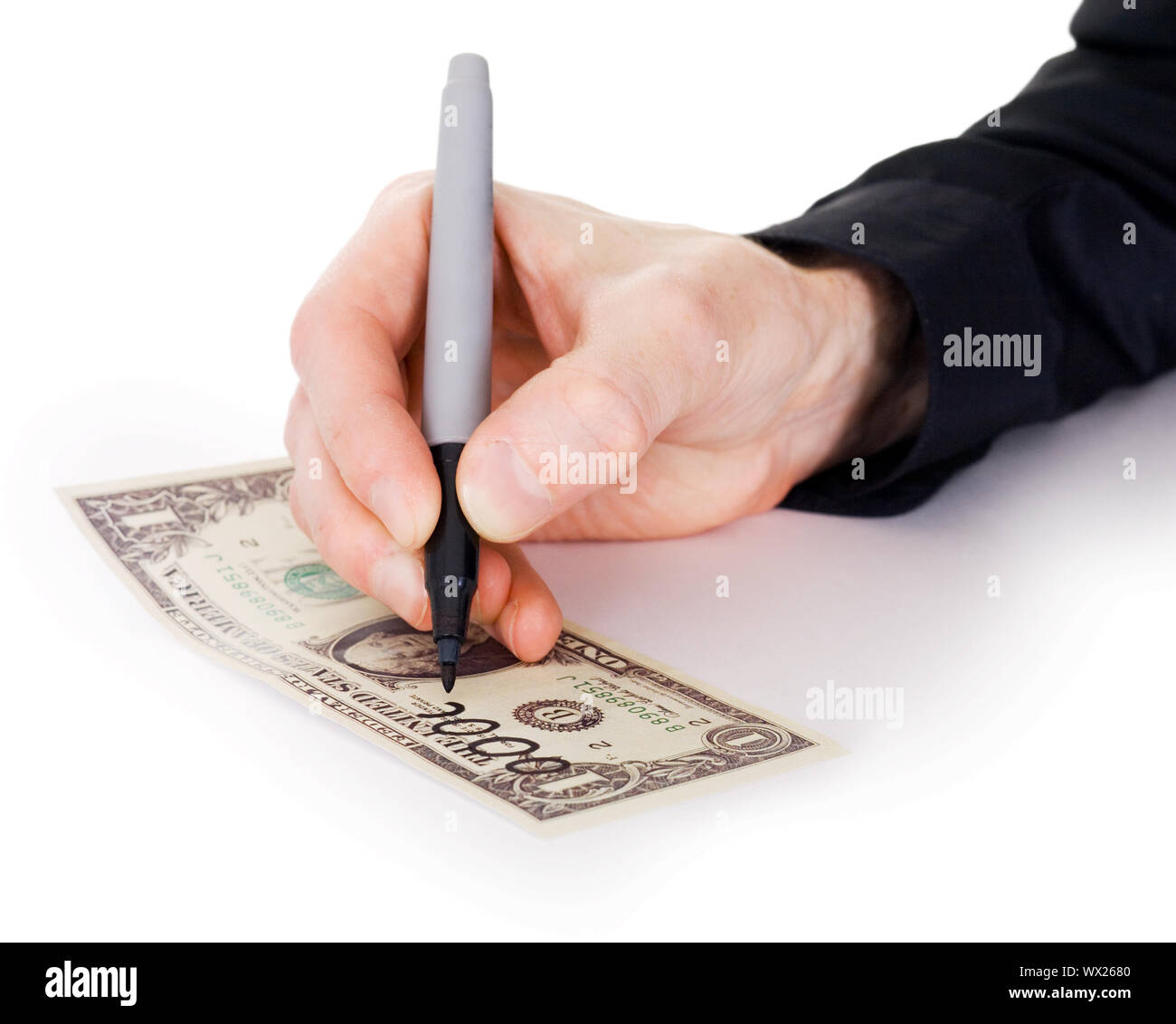 Male hand draw nil on dollar photographed on a white background Stock ...