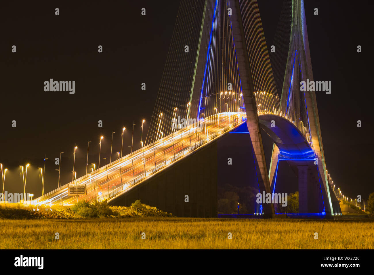Illuminated Pont de Normandy by night, French bridge over Seine Stock ...