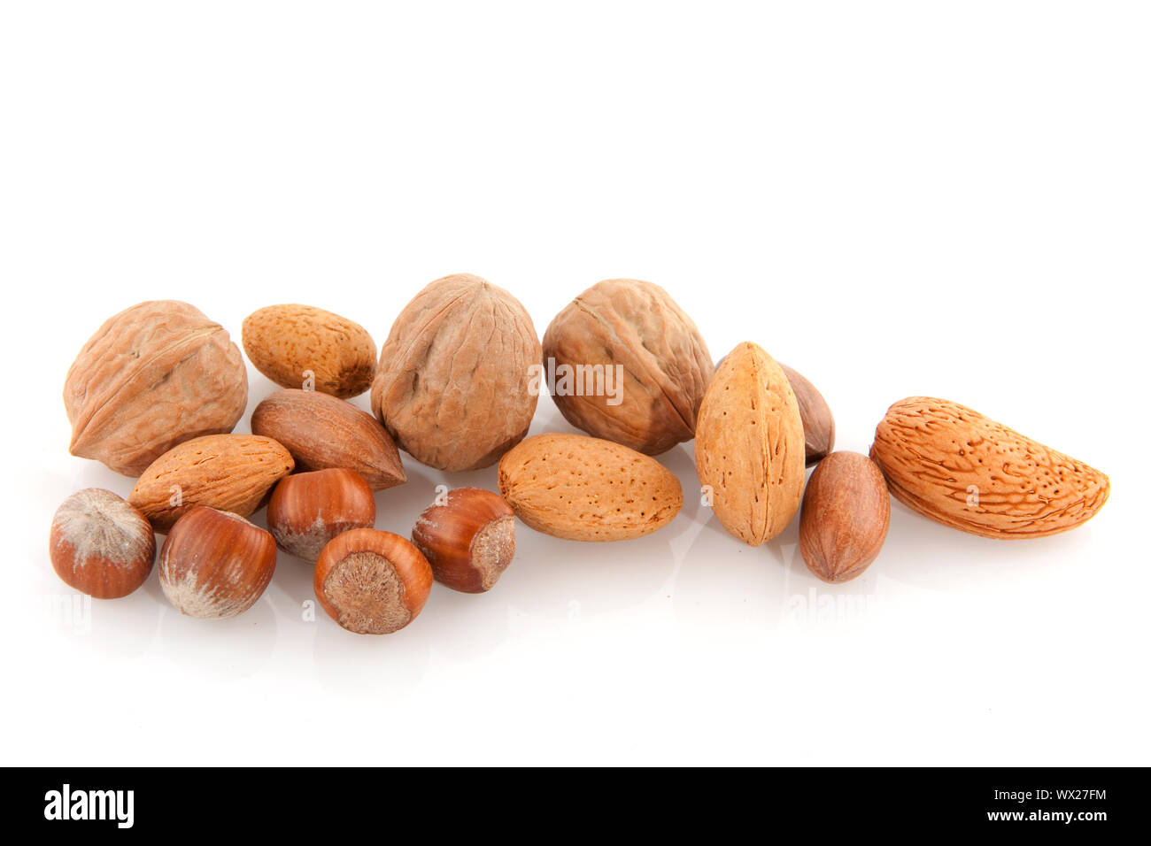 diversity of healthy nuts isolated over white Stock Photo - Alamy