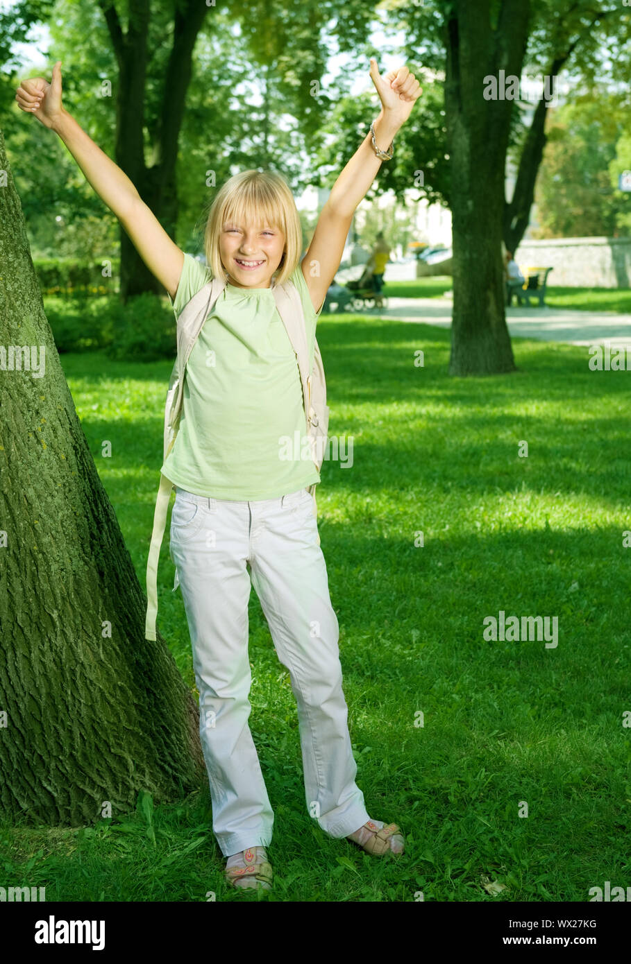 Happy School Girl Outdoor Stock Photo - Alamy