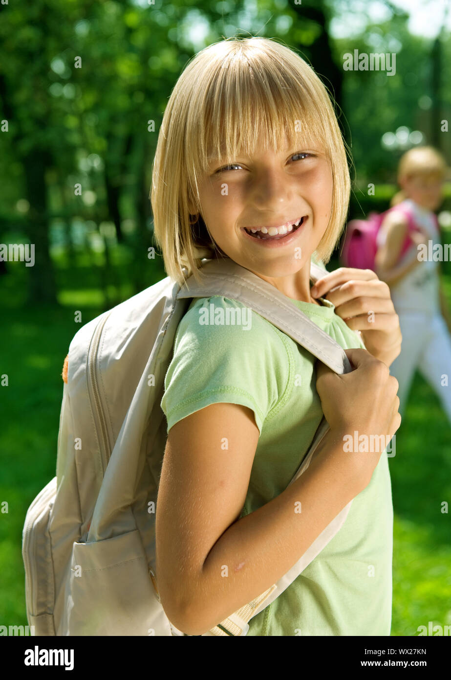 Happy Schoolgirl Outdoor. Back To School Stock Photo - Alamy