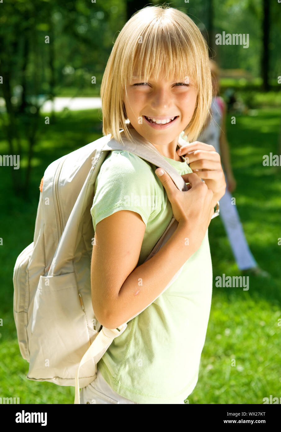 Happy Schoolgirl Outdoor. Back To School Stock Photo - Alamy