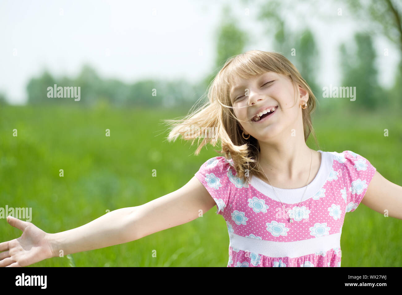 Happy Little Girl Outdoor Stock Photo - Alamy