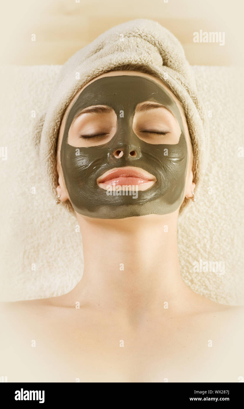 Spa. Mud Mask On The Woman's Face Stock Photo - Alamy