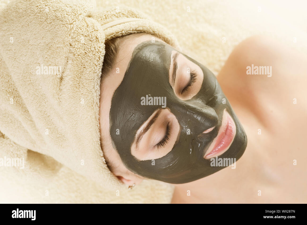 Spa. Mud Mask On The Woman's Face Stock Photo - Alamy