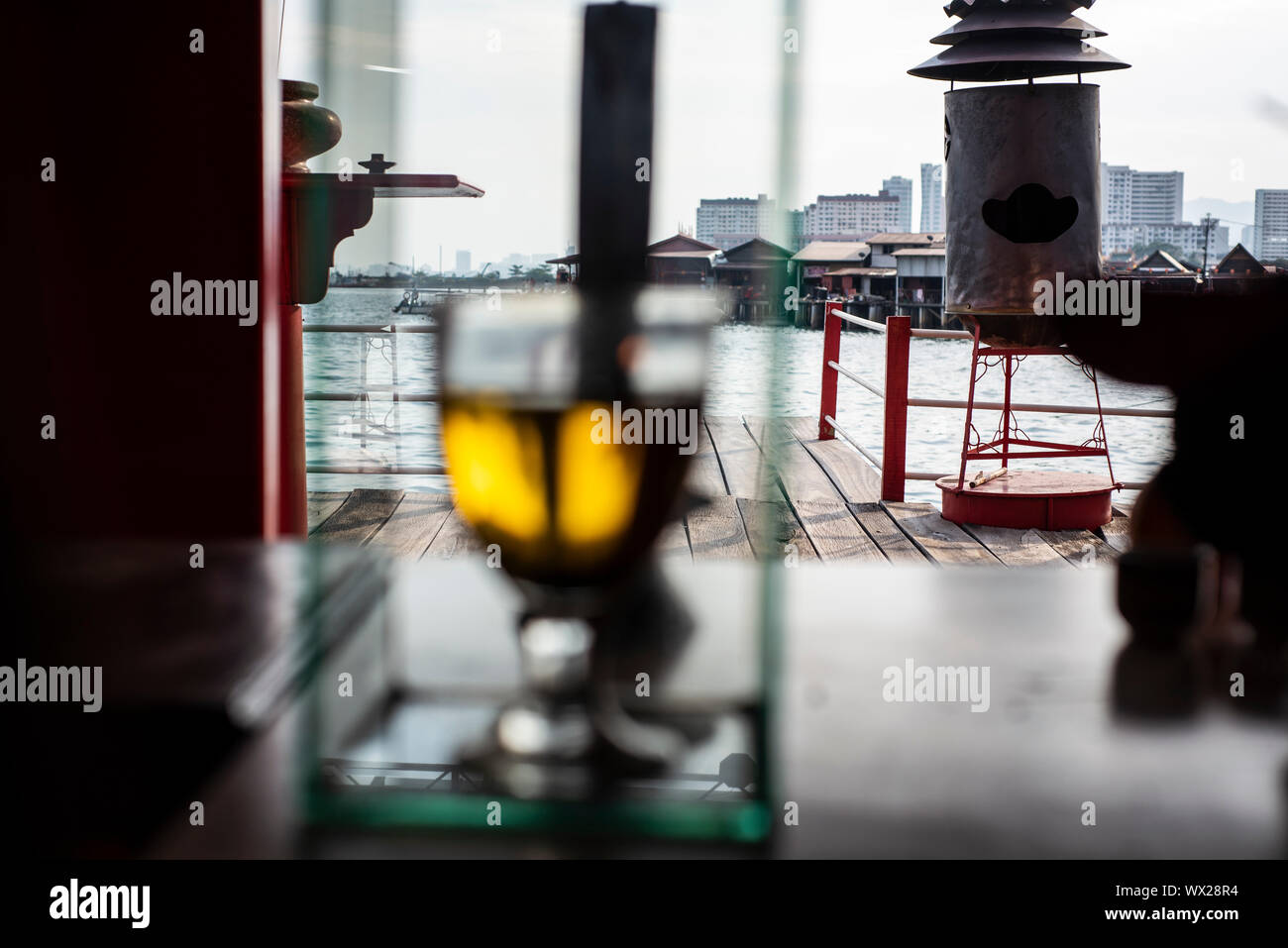 Daily life in the Clan Jetties villages, George Town, Penang Island ...