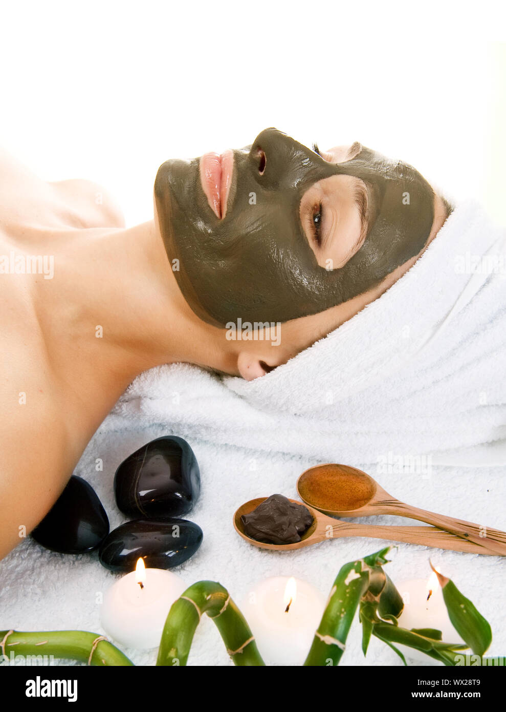 Spa. Mud Mask On The Face. Isolated On White Stock Photo - Alamy