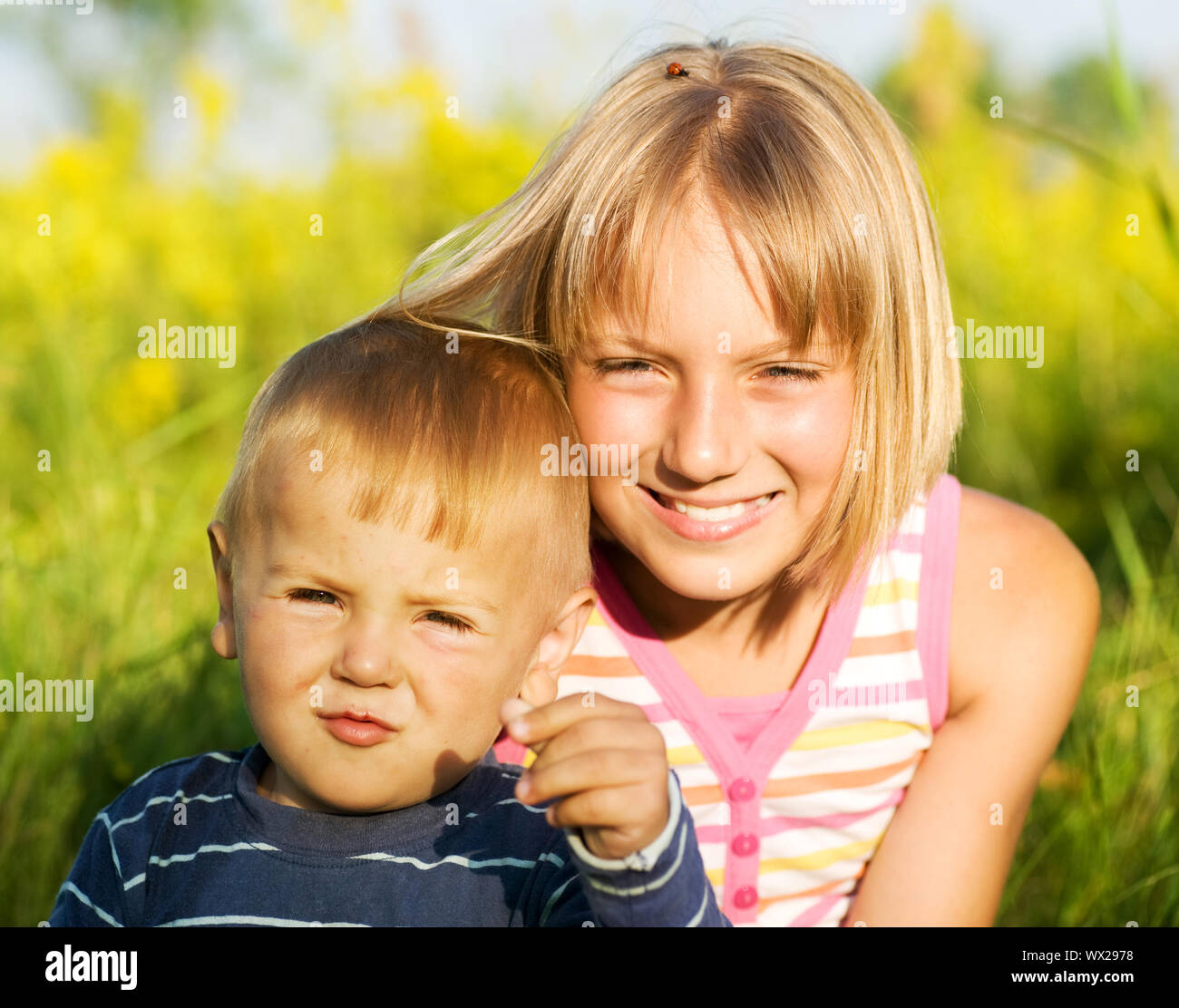 Happy Sister And Brother Outdoor Stock Photo - Alamy