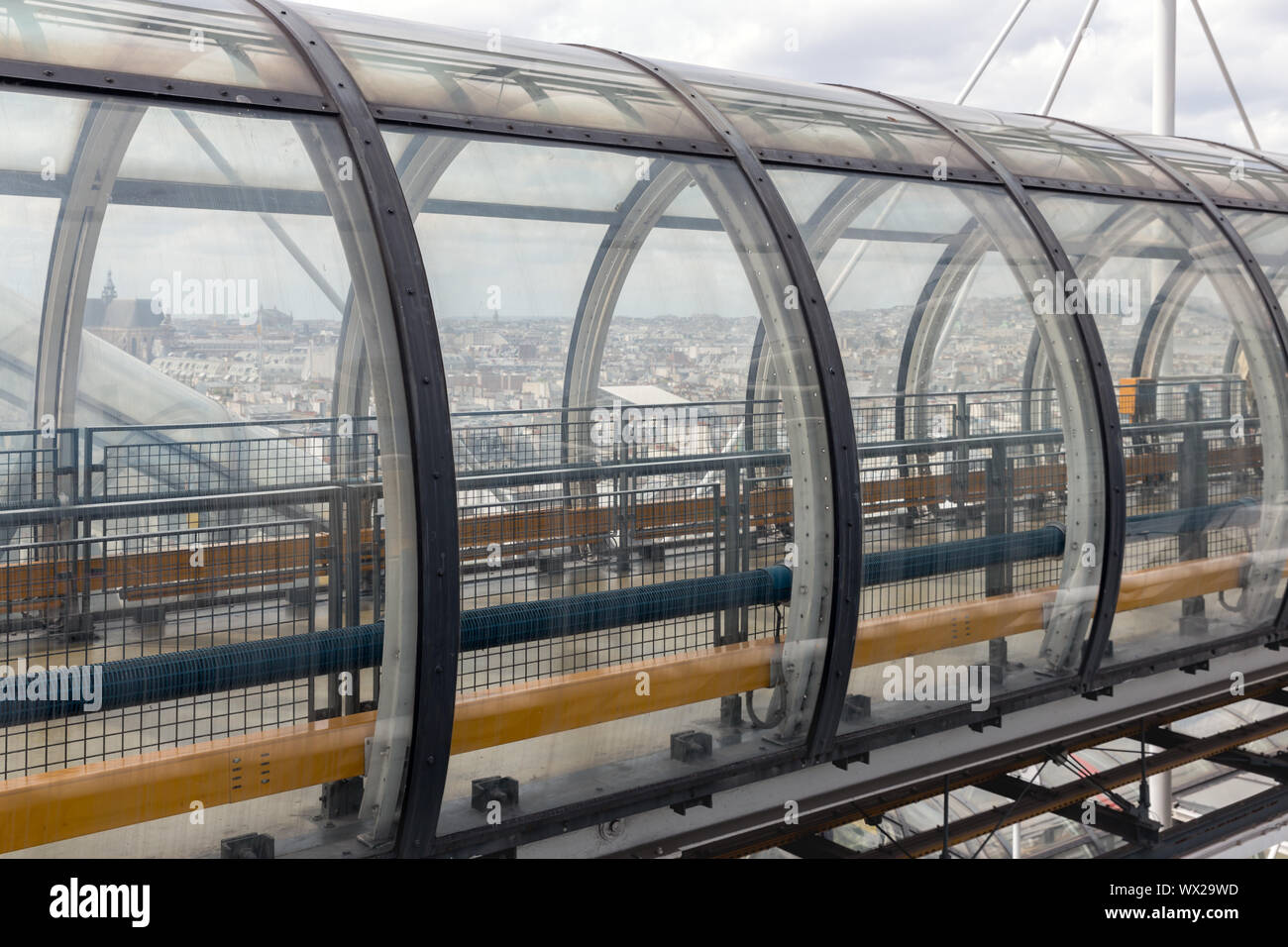 Glass tube corridor at Pompidou Centre with aerial view at Paris Stock ...