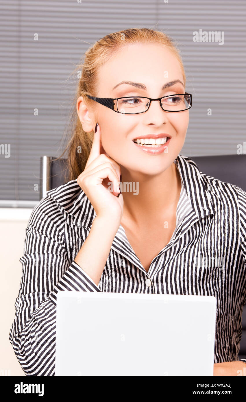 picture of lovely girl with computer in office Stock Photo - Alamy