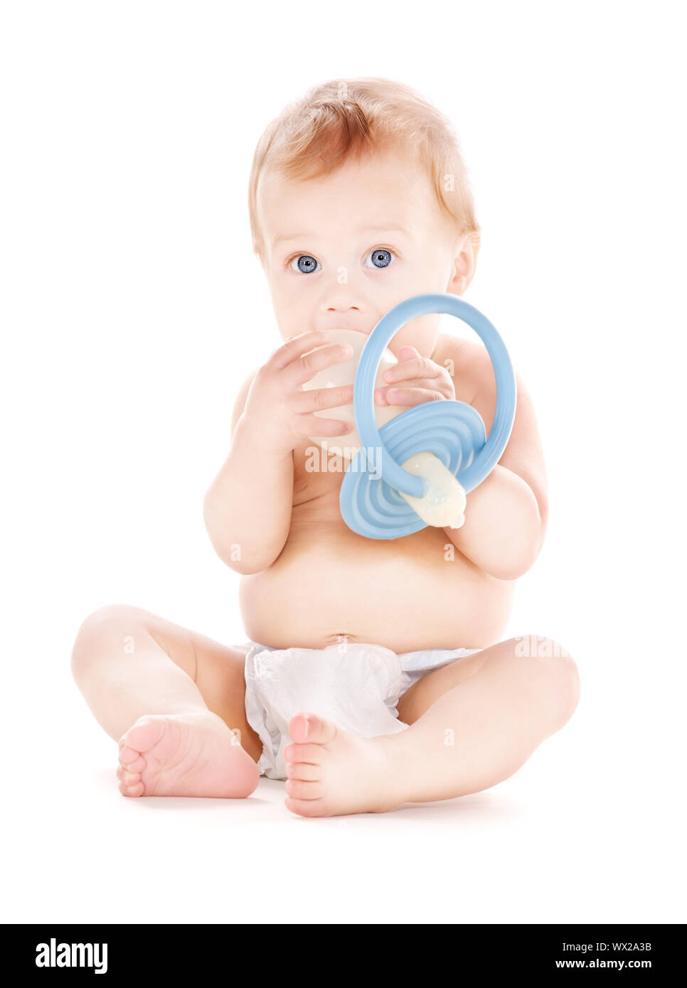 picture of baby boy with big pacifier over white Stock Photo - Alamy