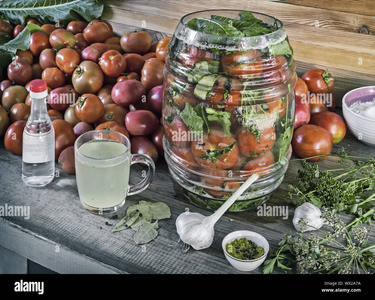 Ripe salted tomatoes in a glass jar Stock Photo - Alamy