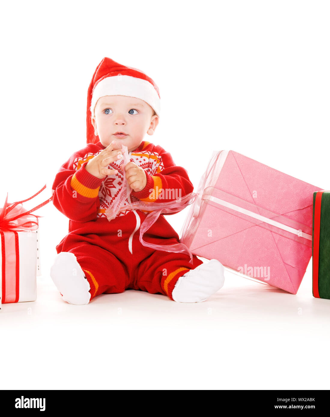 santa helper baby with christmas gifts over white Stock Photo - Alamy