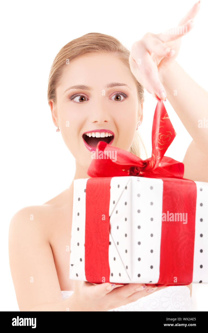 happy girl with gift box over white Stock Photo - Alamy