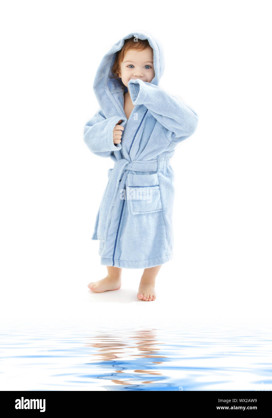 baby boy in blue robe over white Stock Photo - Alamy