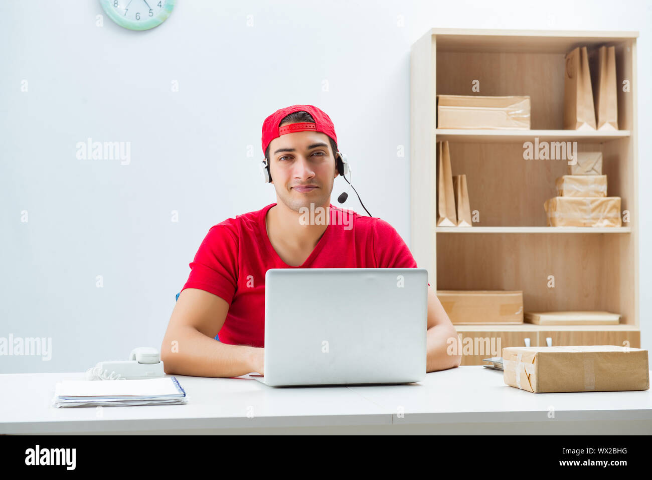 The call center worker at parcel distribution center in post office ...