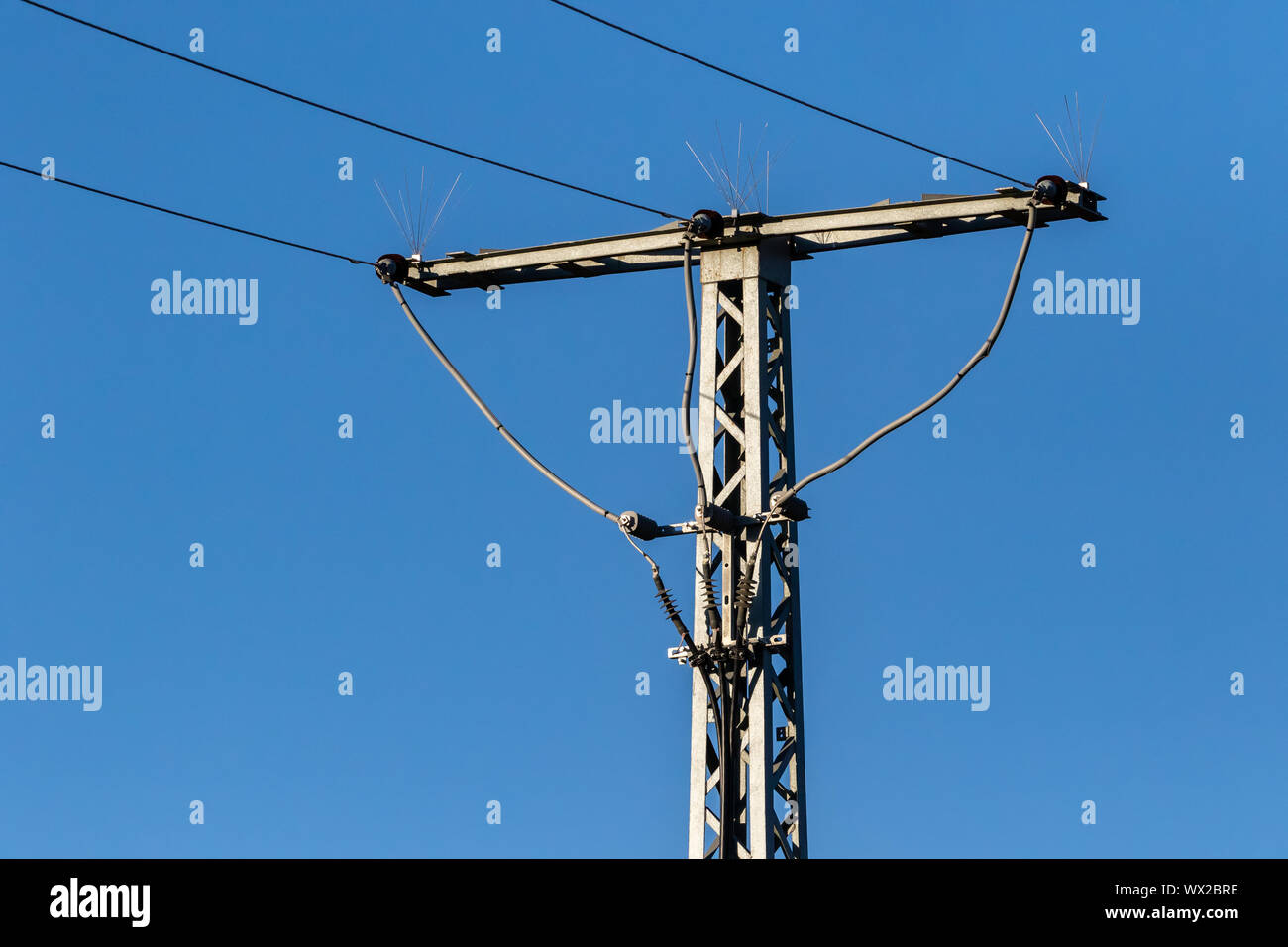 Medium voltage at the lattice mast Stock Photo - Alamy